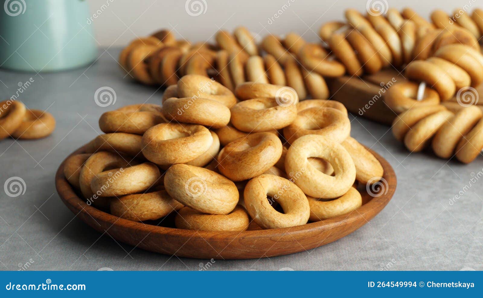Plate with Delicious Ring Shaped Sushki Dry Bagels on Light Grey Table ...