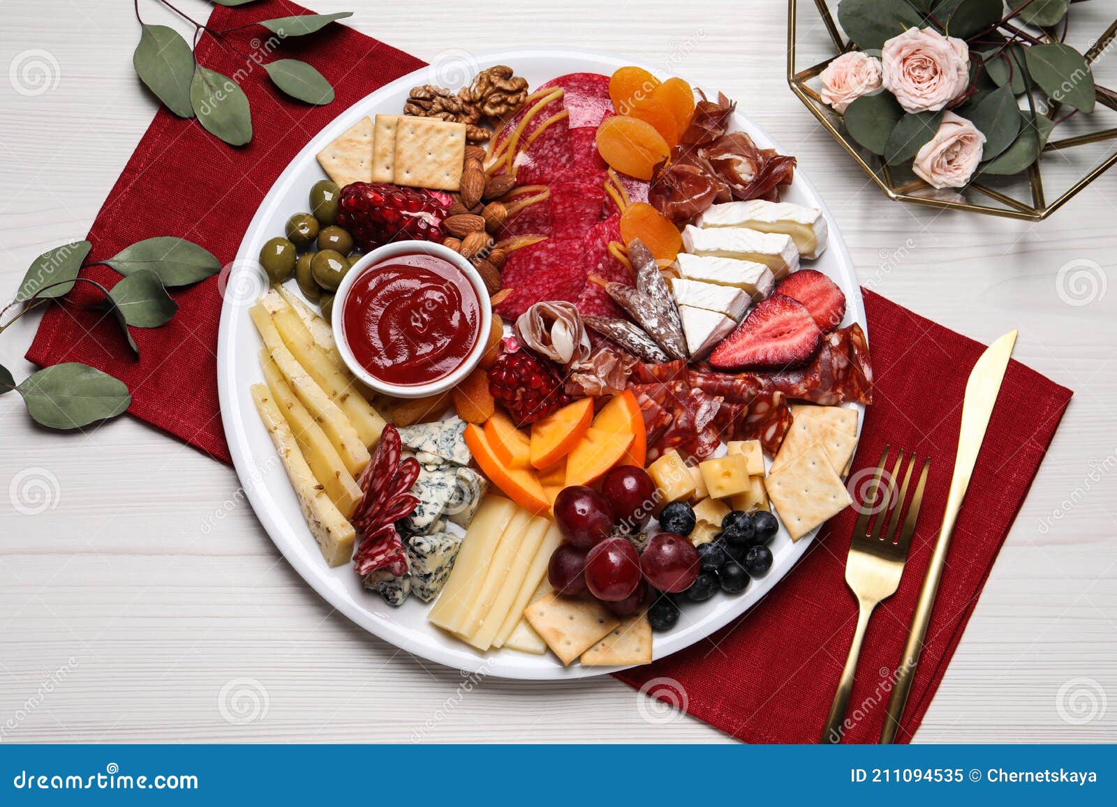 Plate of Different Appetizers with Sauce Served on White Wooden Table ...