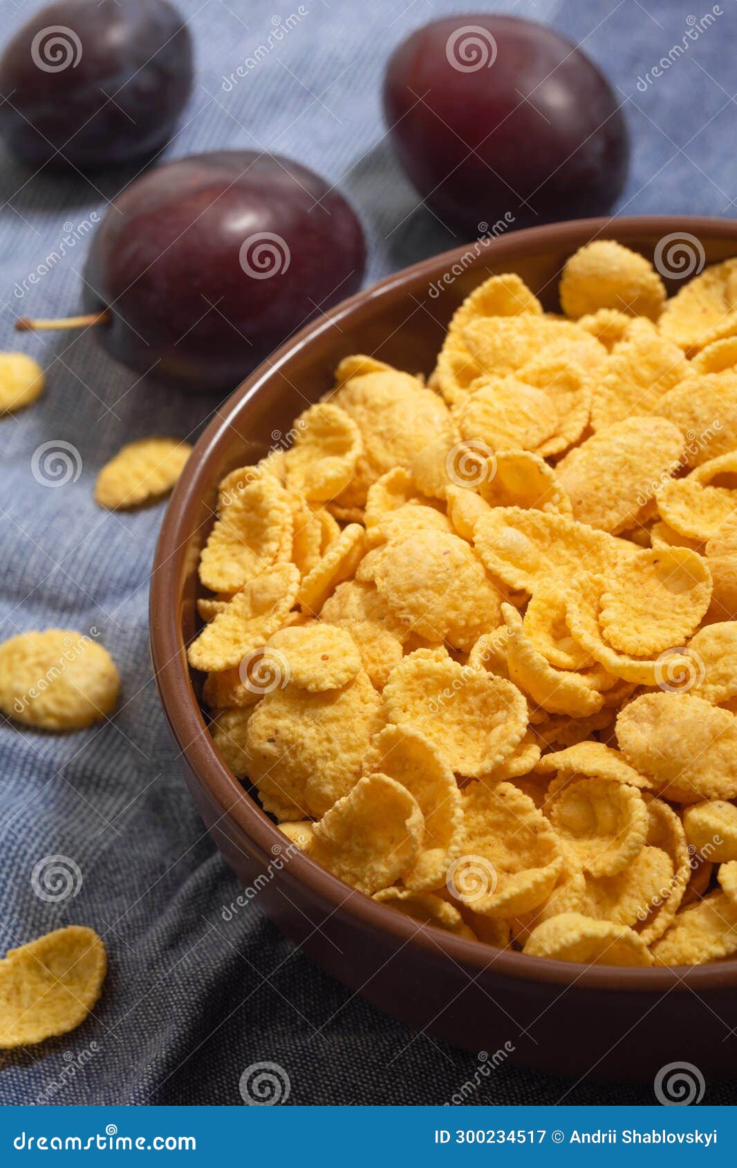 A Plate of Dry Cornflakes on the Table with Fruit. Morning Breakfast ...