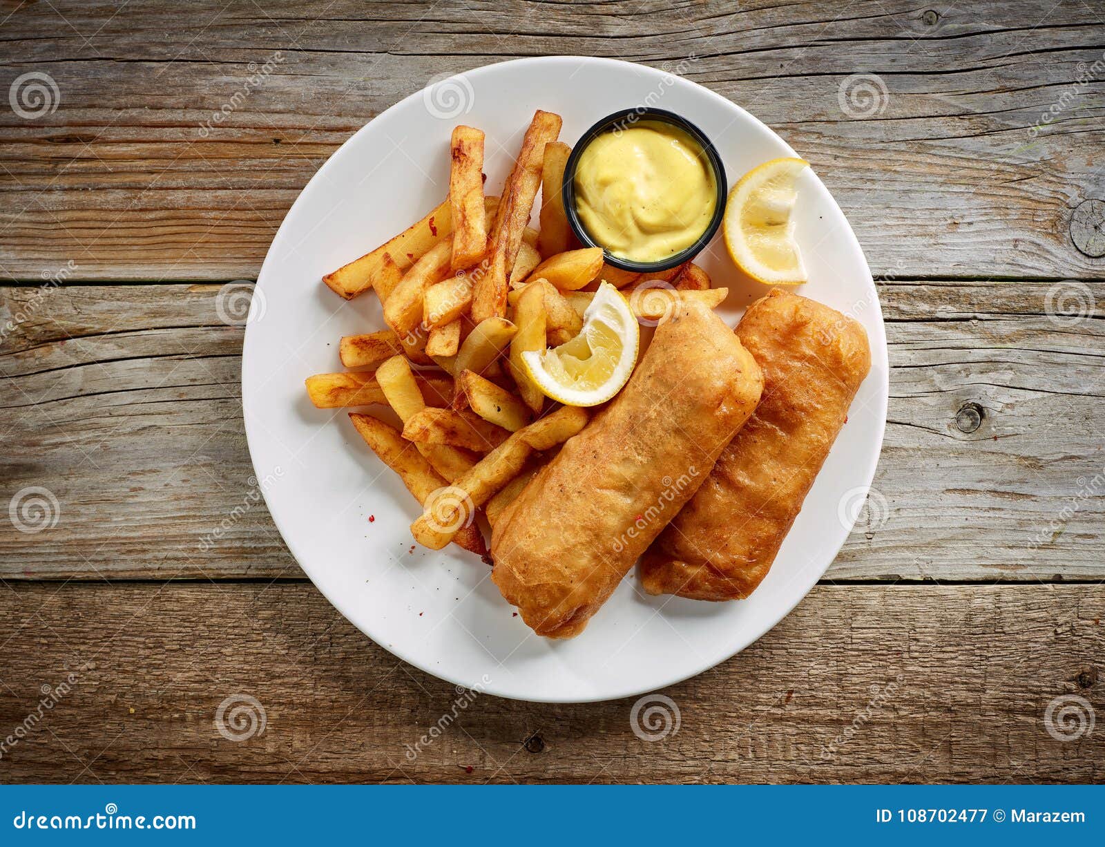 Plate of fish and chips stock image. Image of kitchen - 108702477