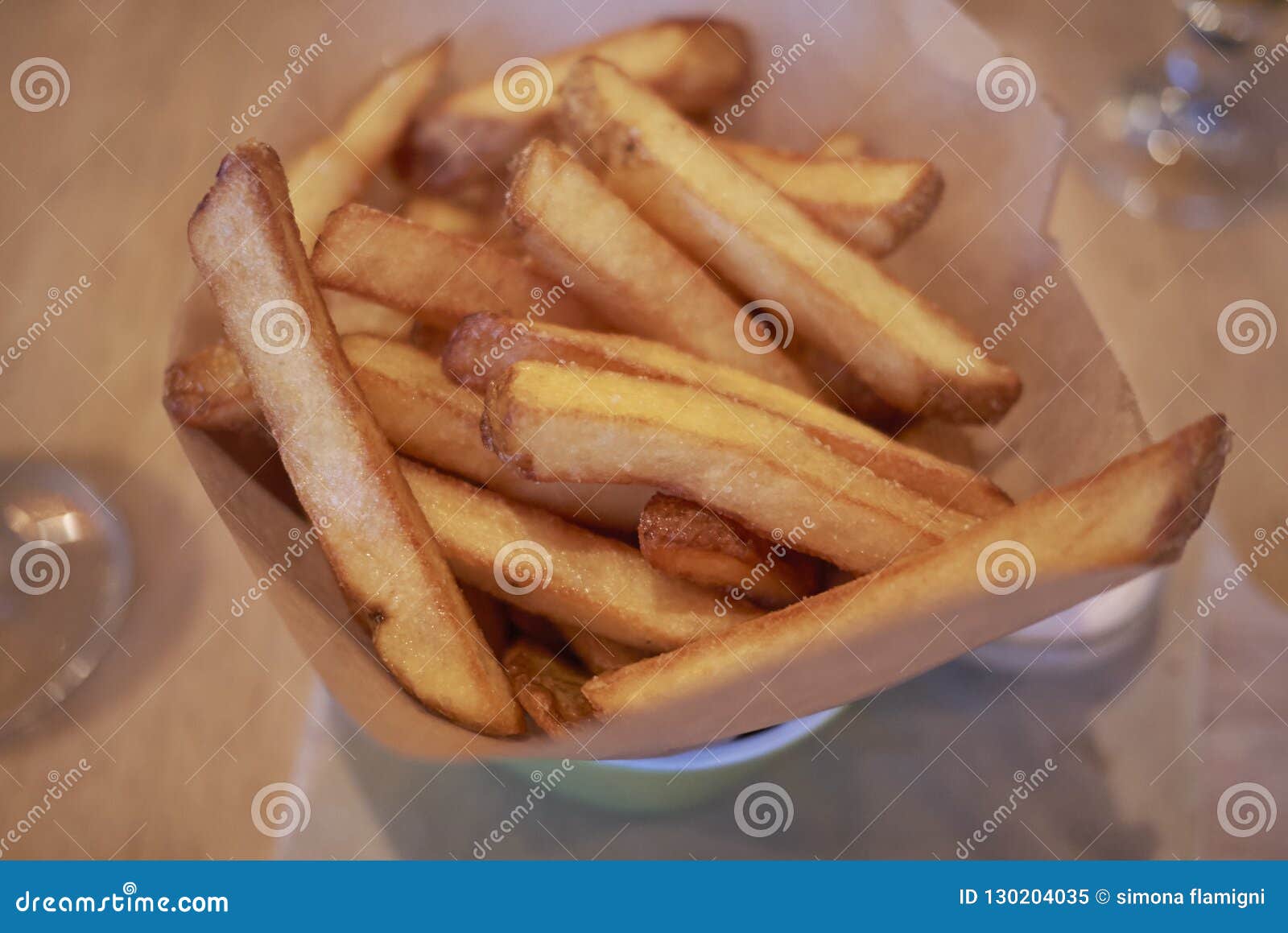 A plate of french fries stock image. Image of potatoes - 130204035