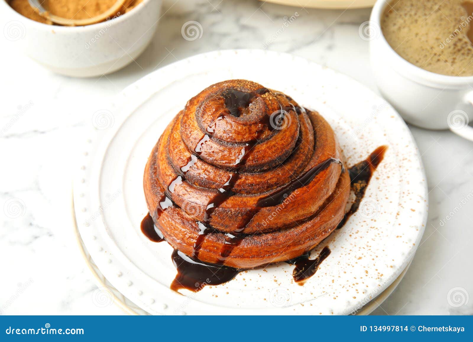 Plate with Freshly Baked Cinnamon Roll Stock Photo - Image of drink ...
