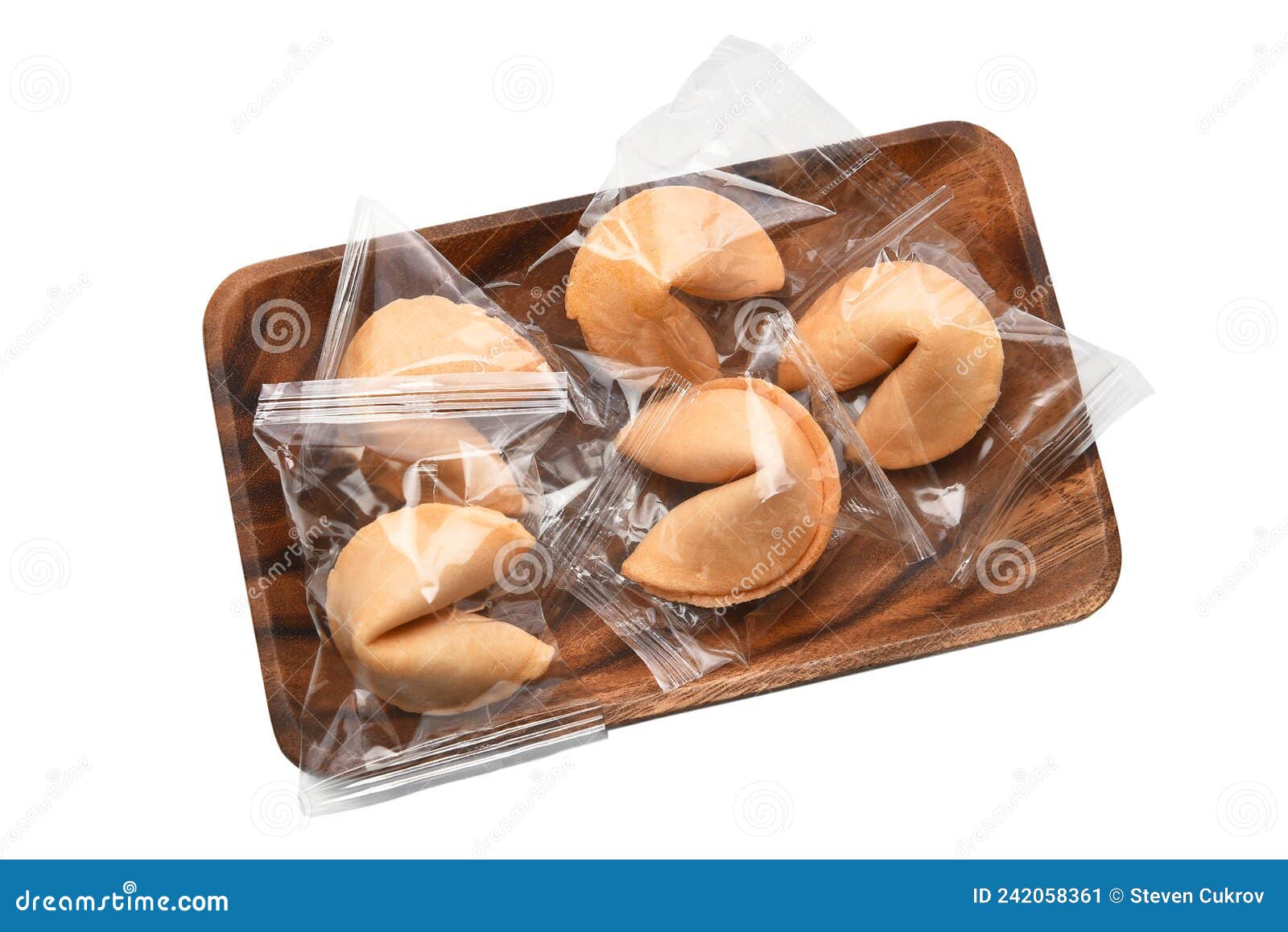 A Plate Full of Fortune Cookies Still Wrapped in Plastic, Isolated on ...