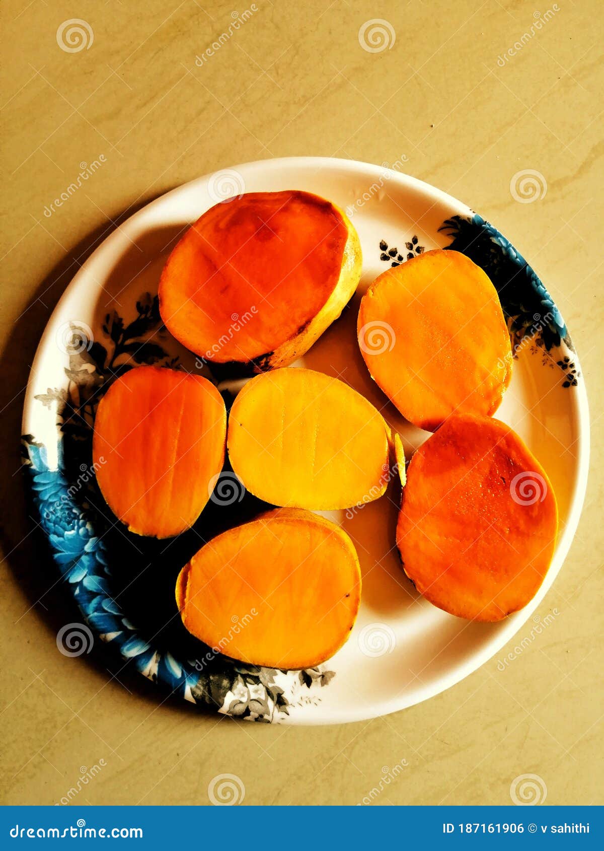 A plate full of mangoes stock photo. Image of fruit - 187161906