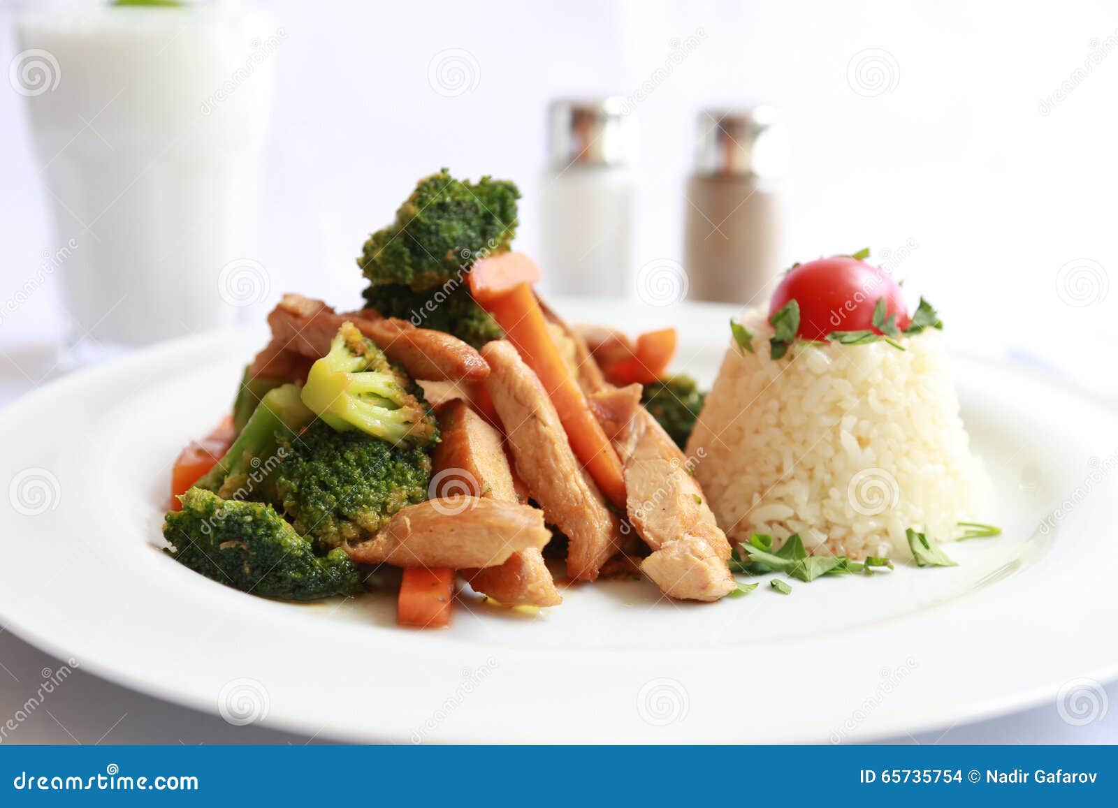 A Plate with Grilled Chicken and Vegetables and Rice Stock Photo ...