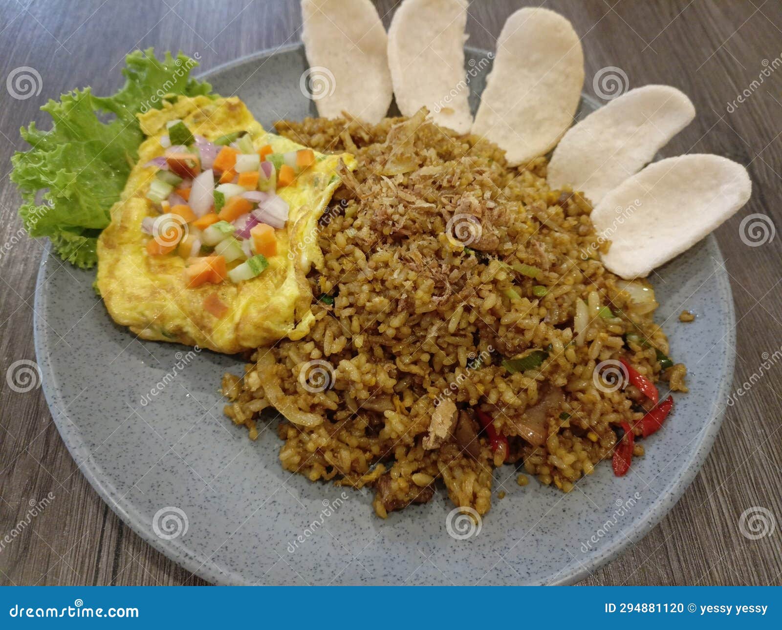 A Plate of Indonesian Fried Rice Stock Photo - Image of dinner ...
