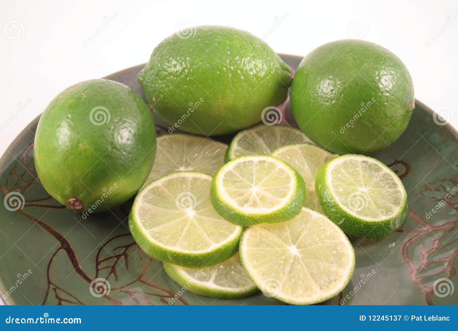 Plate of Limes Isolated stock image. Image of ripe, seasonal - 12245137