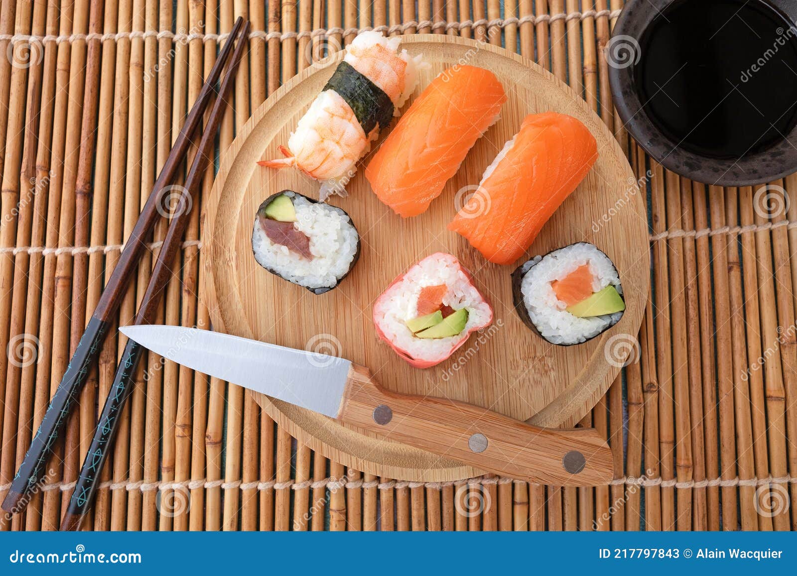 Plate of maki on a table stock image. Image of california - 217797843