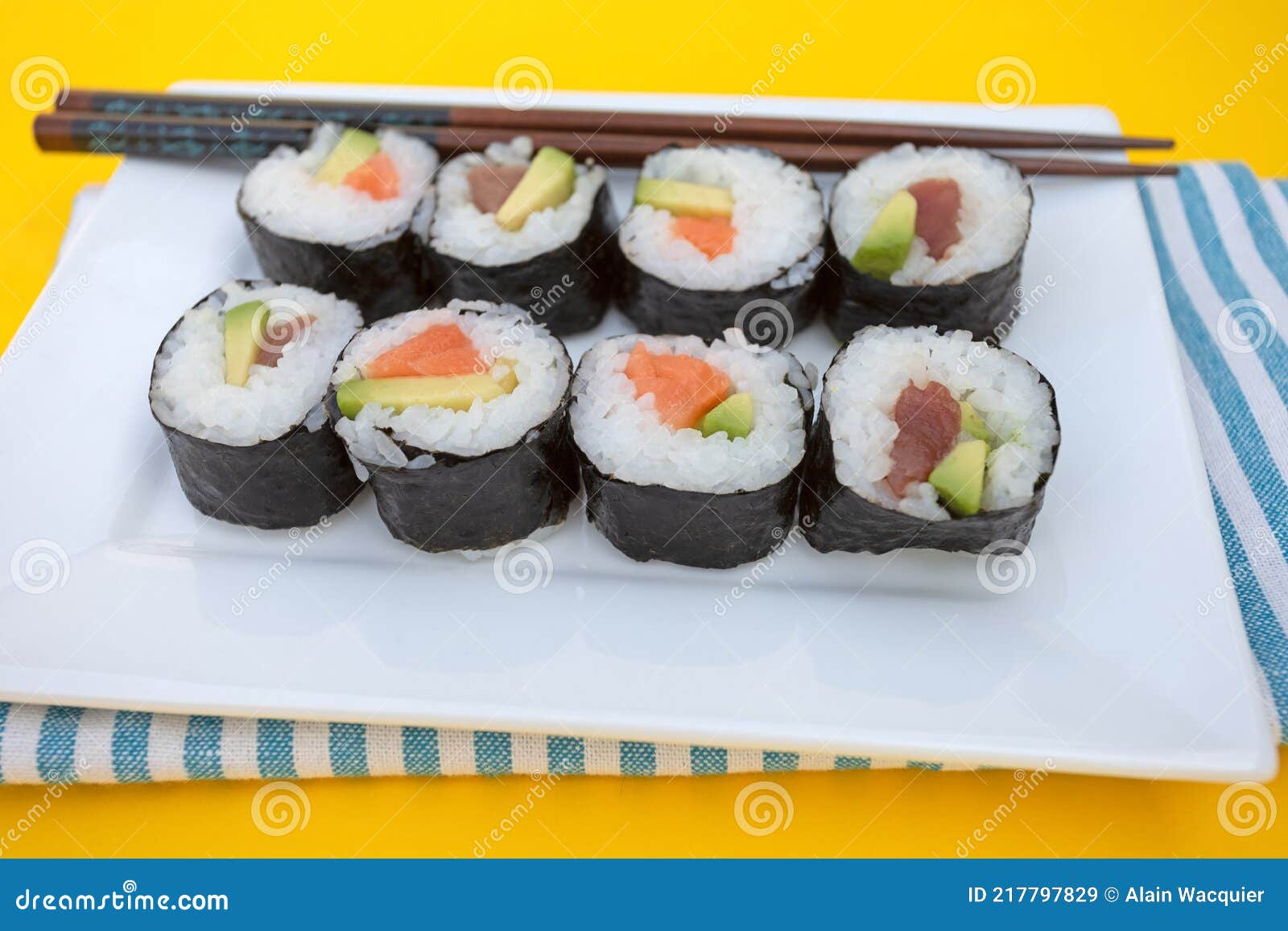 Plate of maki on a table stock image. Image of seafood - 217797829