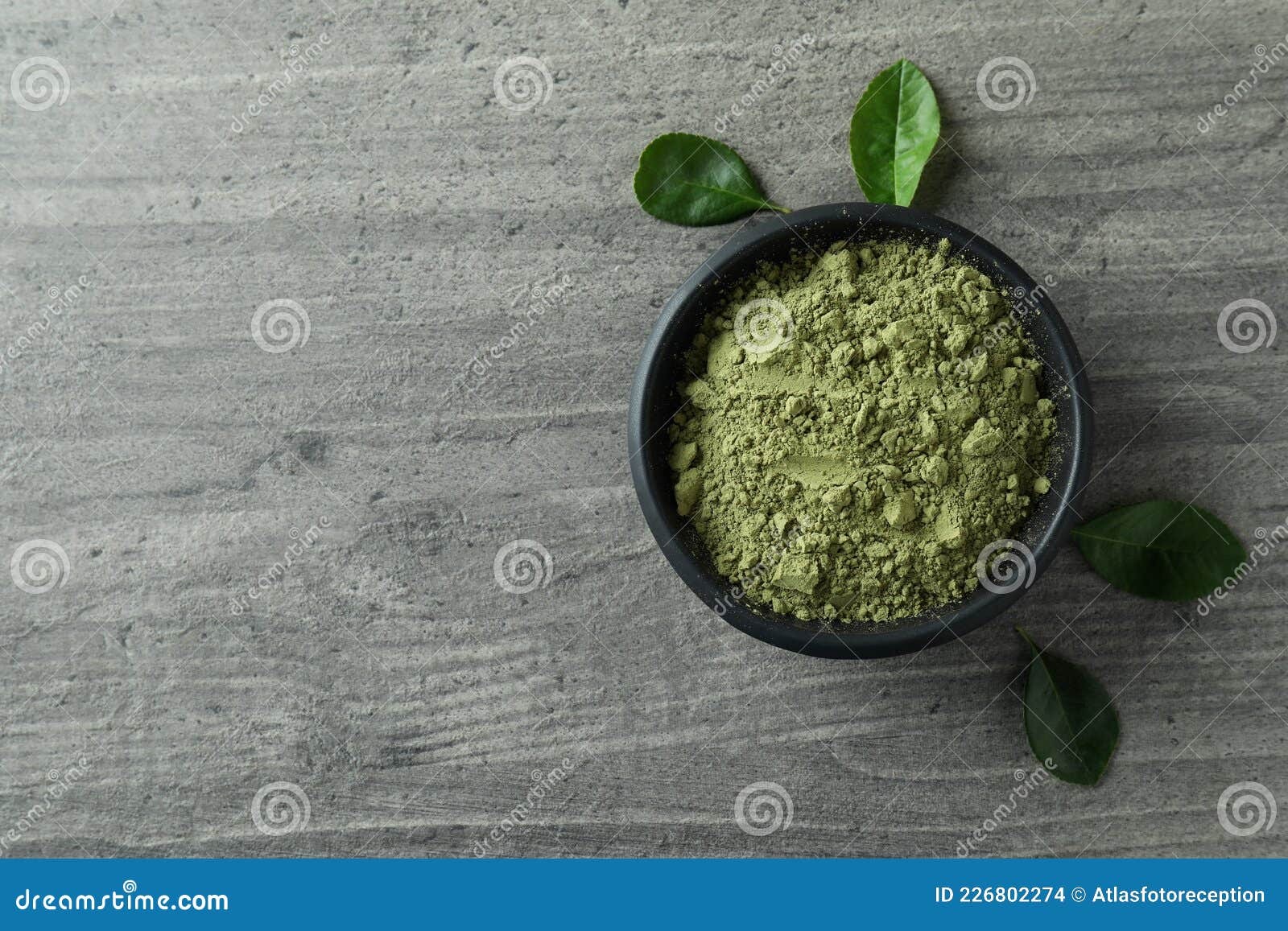 Plate of Matcha Powder on Gray Textured Background Stock Photo - Image ...