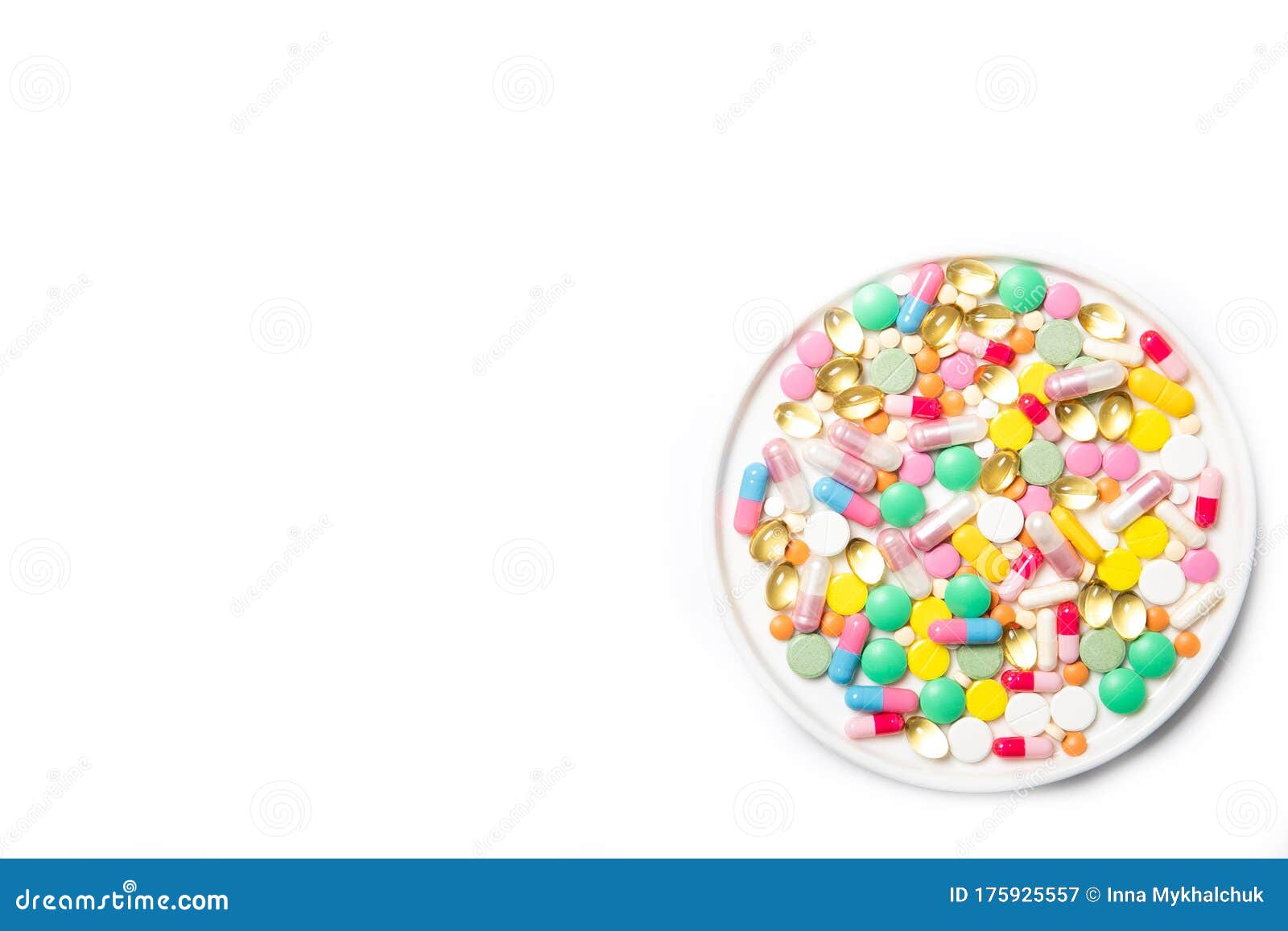 Plate with Multi-colored Pills on a White Background. Dietary ...