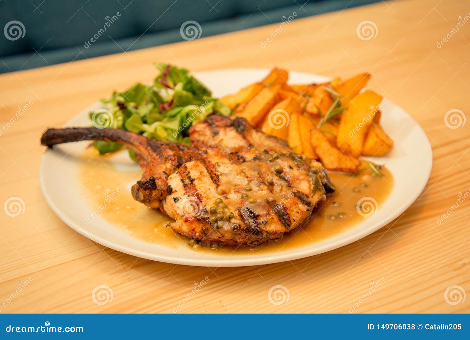 Plate of Mutton Steak or Chops with Potato and Sauce Garnish Stock ...