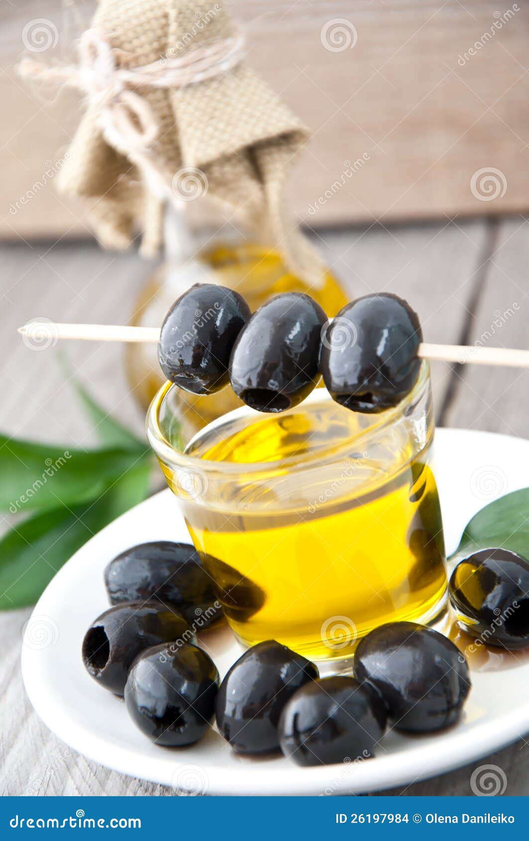 Plate with Olives and a Bottle of Olive Oil Stock Photo - Image of ...