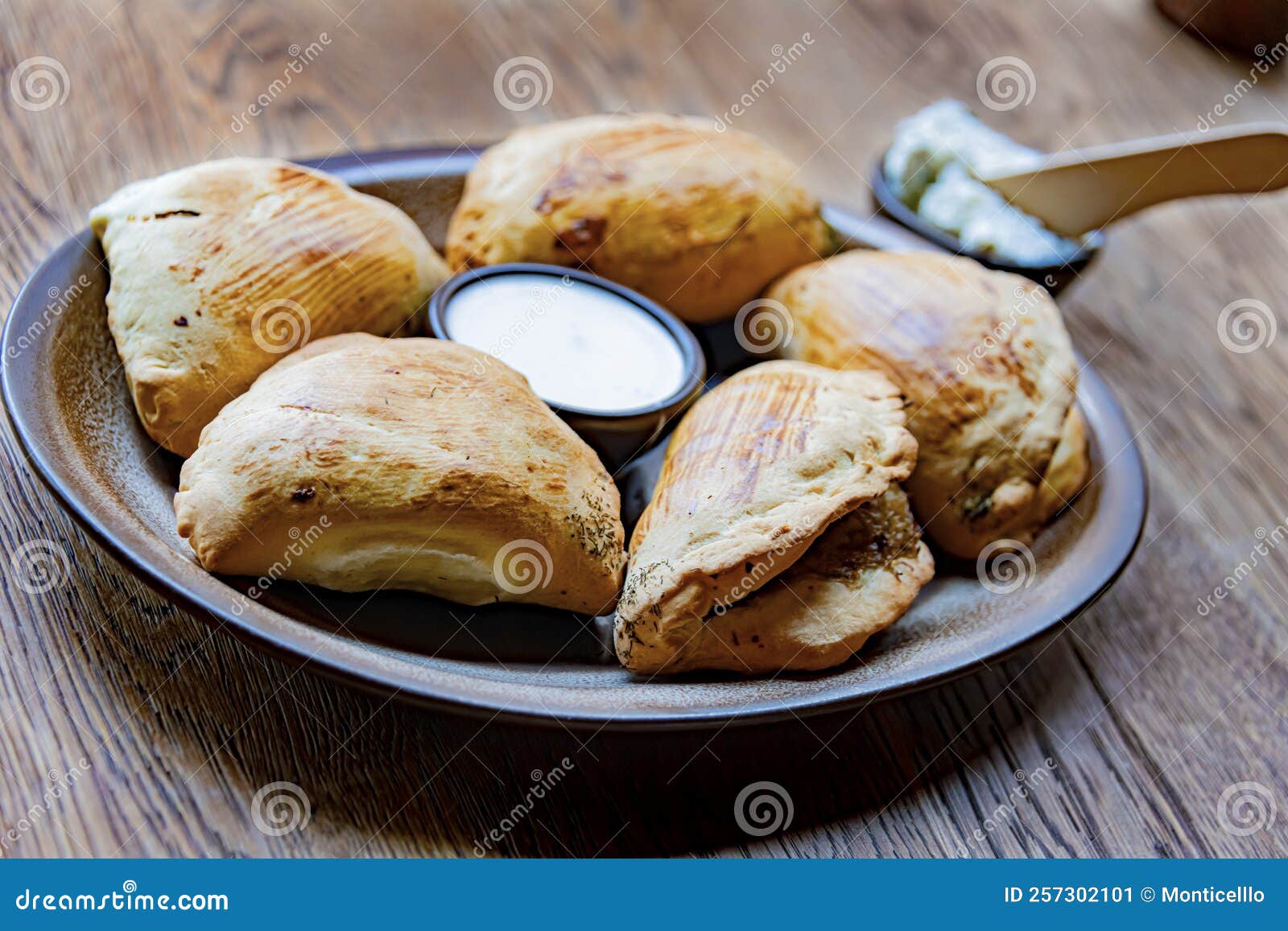A Plate of Oven-baked Pierogi on a Restaurant Table Stock Image - Image ...