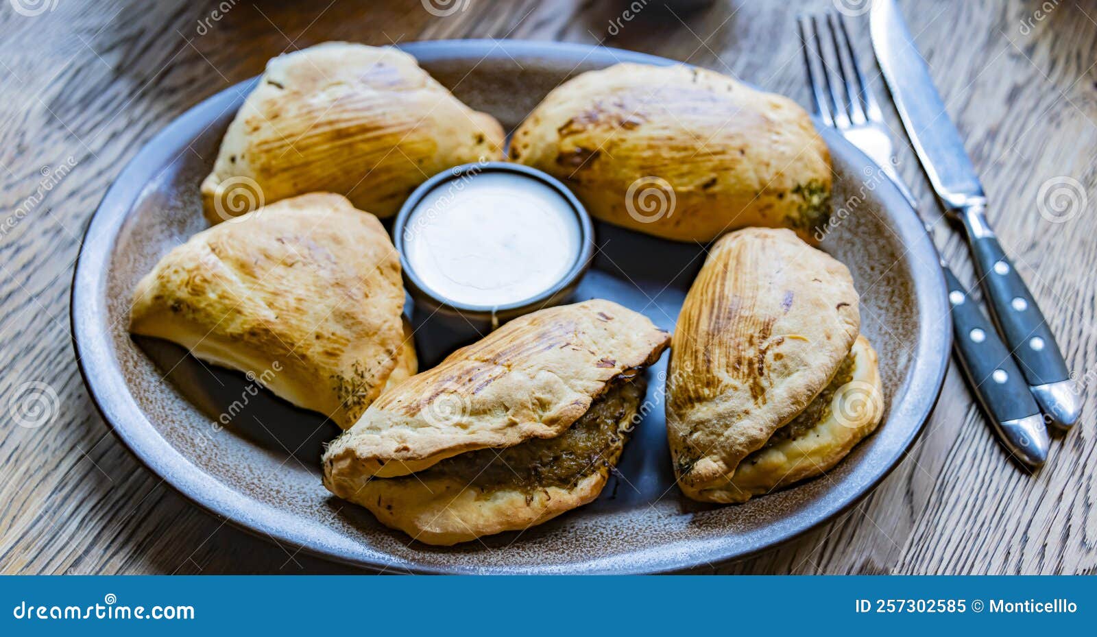 A Plate of Oven-baked Pierogi on a Restaurant Table Stock Image - Image ...