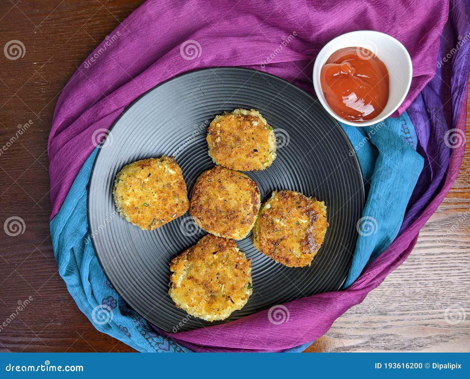 A Plate With Paneer Cutlet, A Breaded Crispy Patty Royalty-Free Stock ...