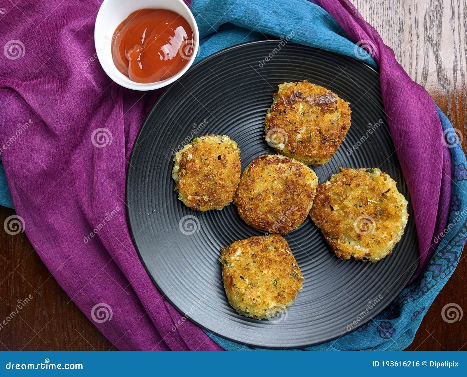 A Plate with Paneer Cutlet, a Breaded Crispy Patty. Stock Photo - Image ...