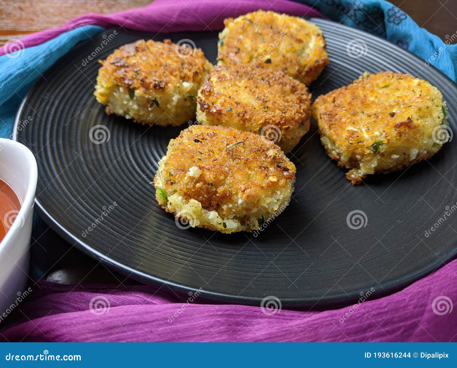A Plate With Paneer Cutlet, A Breaded Crispy Patty Royalty-Free Stock ...