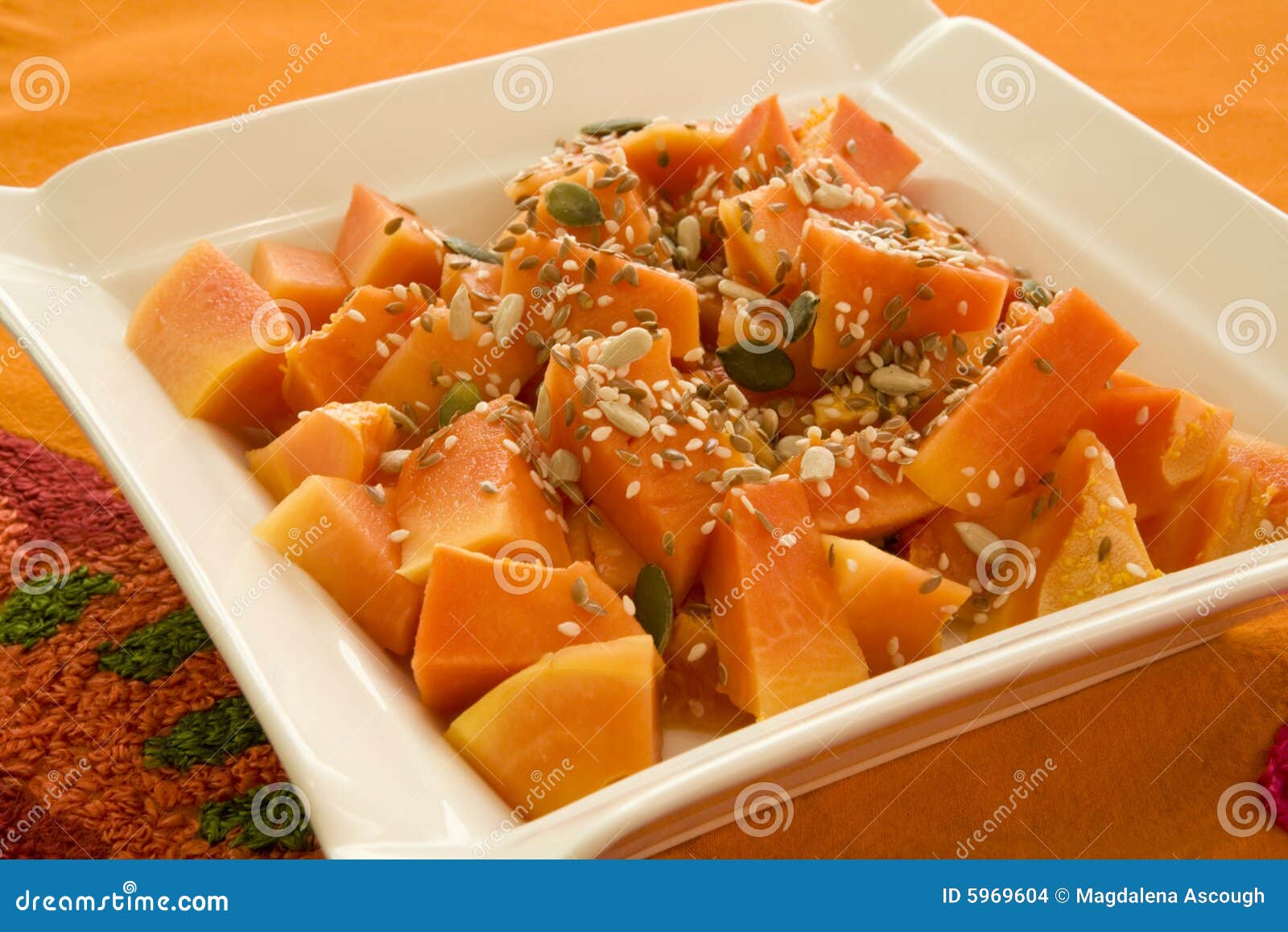 Plate of Papaya Cubes and Mixed Seeds Stock Photo - Image of cloth ...