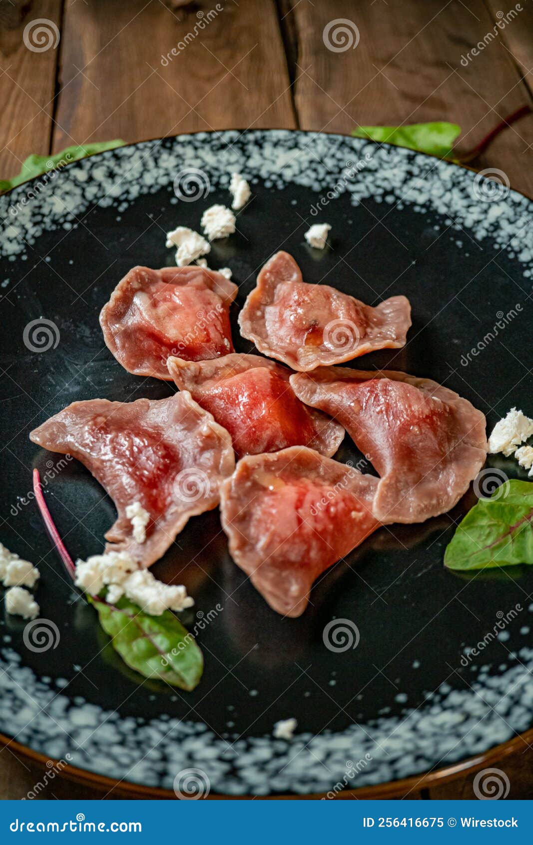 Plate of Pelmeni Dumplings with Herbs on a Wooden Surface Stock Image ...