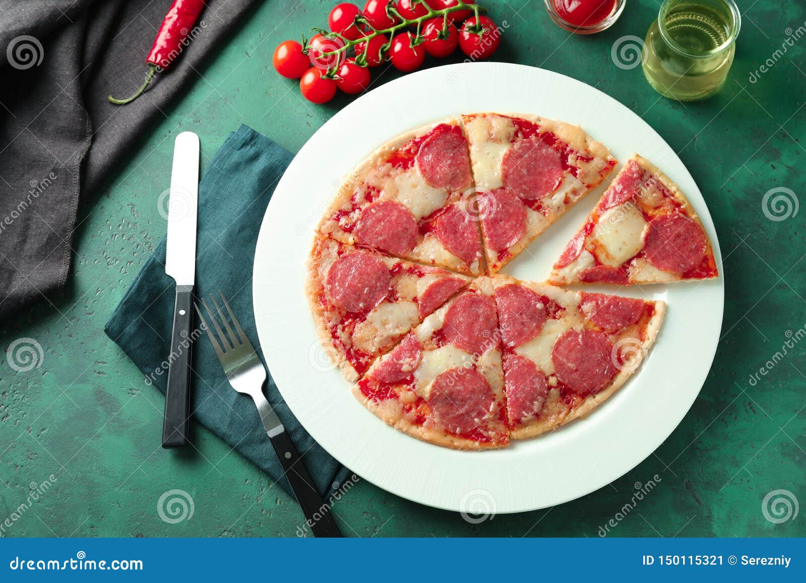 Plate with Pieces of Pepperoni Pizza on Table Stock Image - Image of ...
