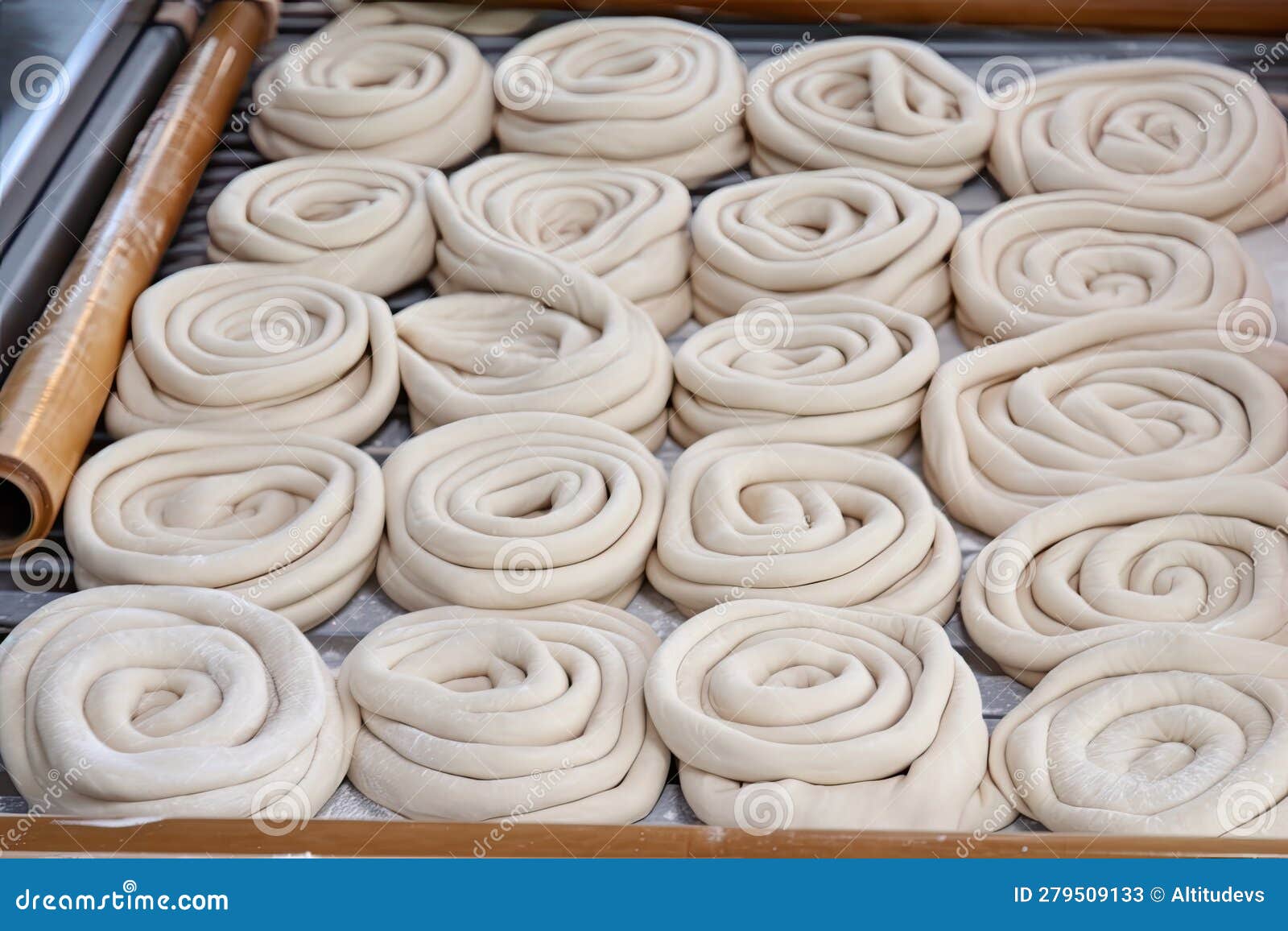 Plate of Pizza Dough Rolled into Ropes, Ready To Be Stretched and ...