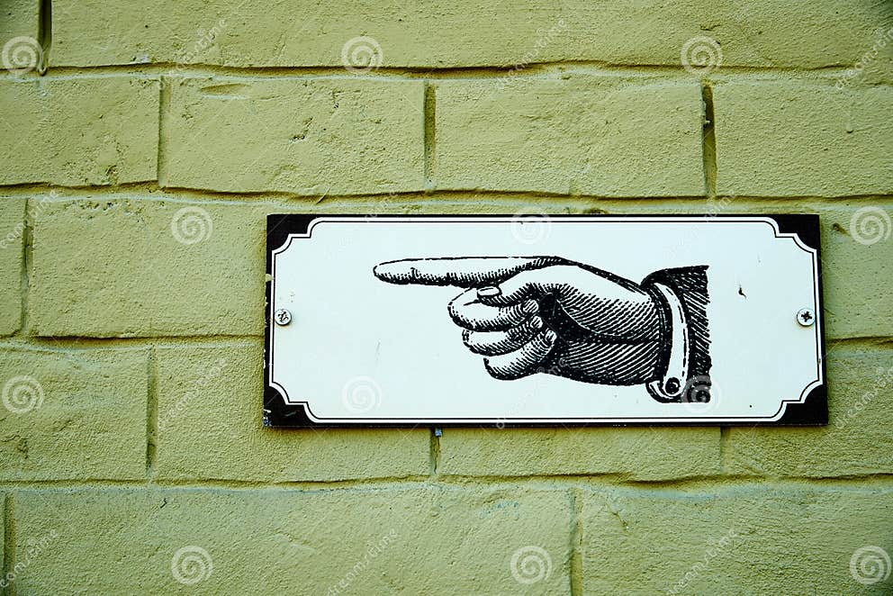 Plate with Pointer Indicator Stock Image - Image of brick, hand: 128001255
