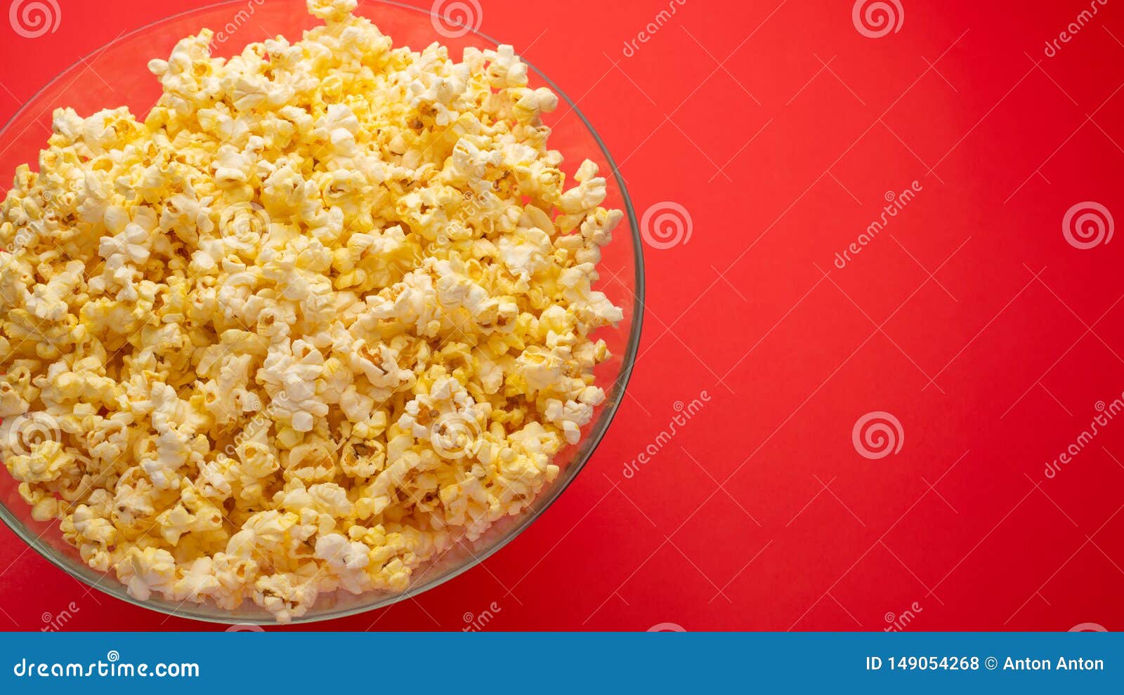 Plate with Popcorn on a Red Background. Layout. Top View Stock Photo ...