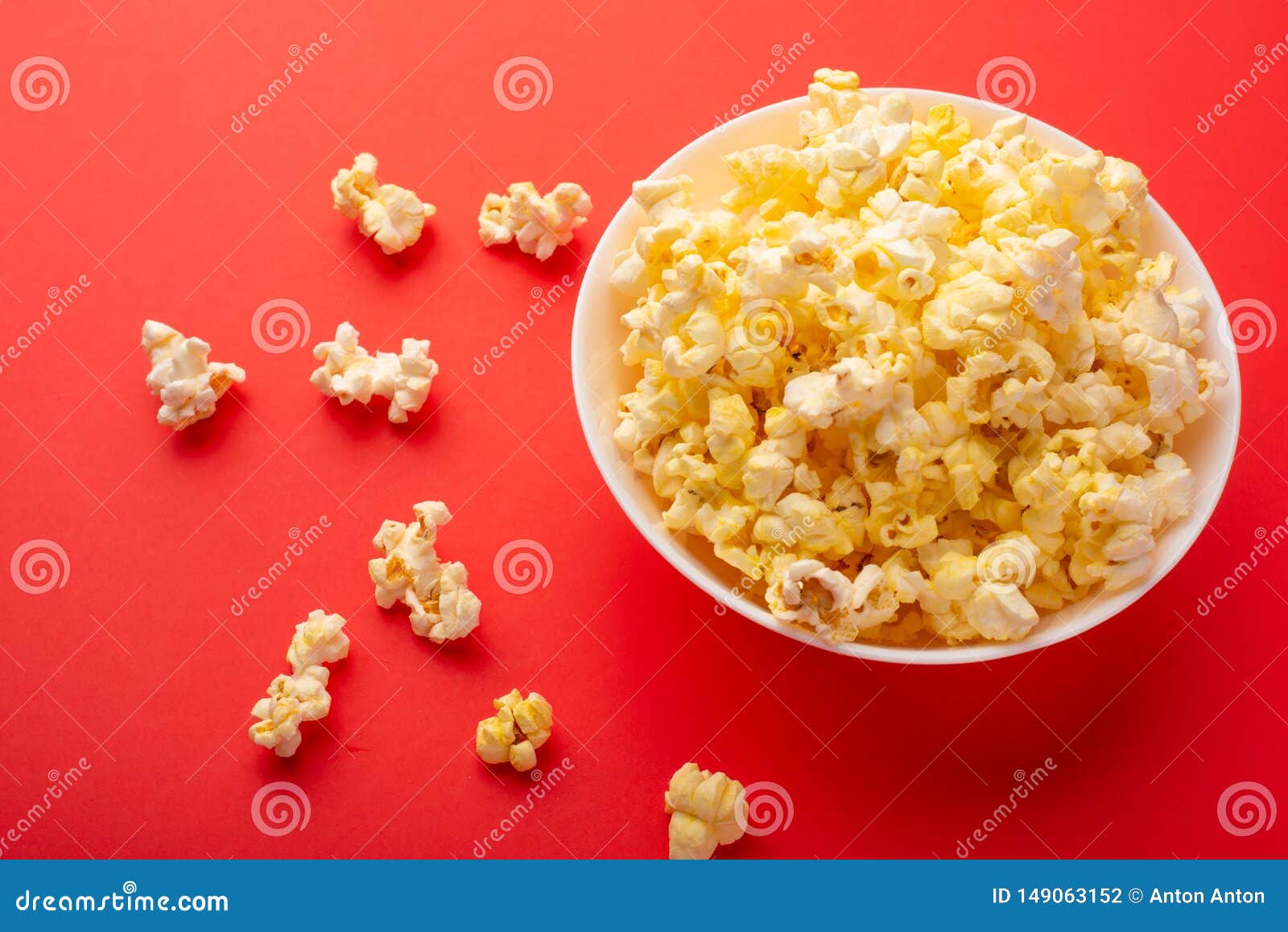 Plate with Popcorn on a Red Bright Background. Movie Viewing Concept ...