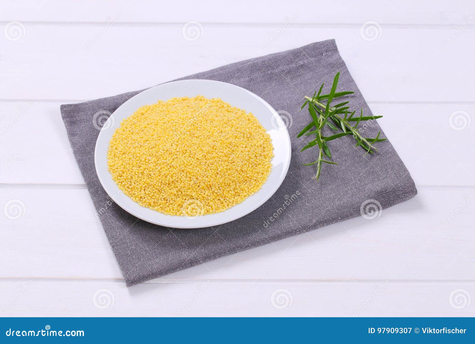 Plate of raw millet stock image. Image of hard, wooden - 97909307