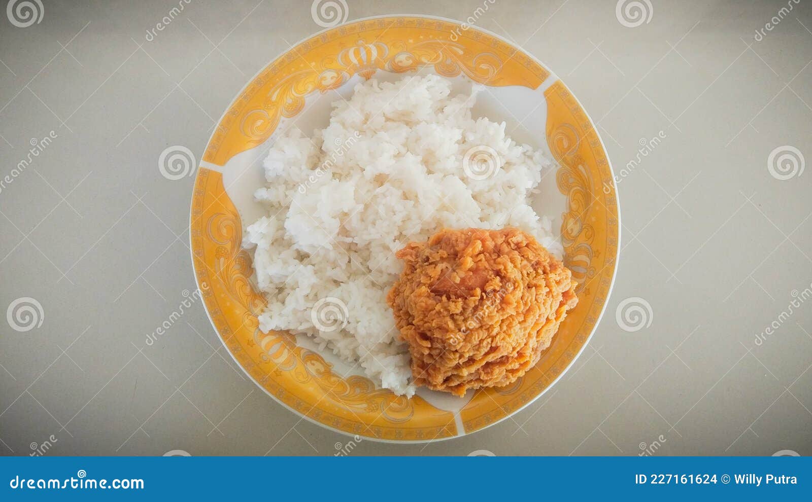 A Plate of Rice and Fried Chicken Stock Photo - Image of meat, snack ...