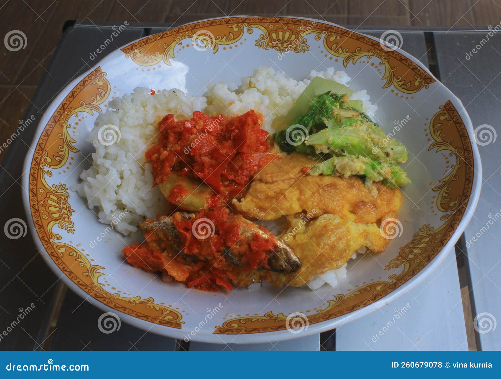 A Plate of Rice with Fried Fish Stock Photo - Image of vegetables ...