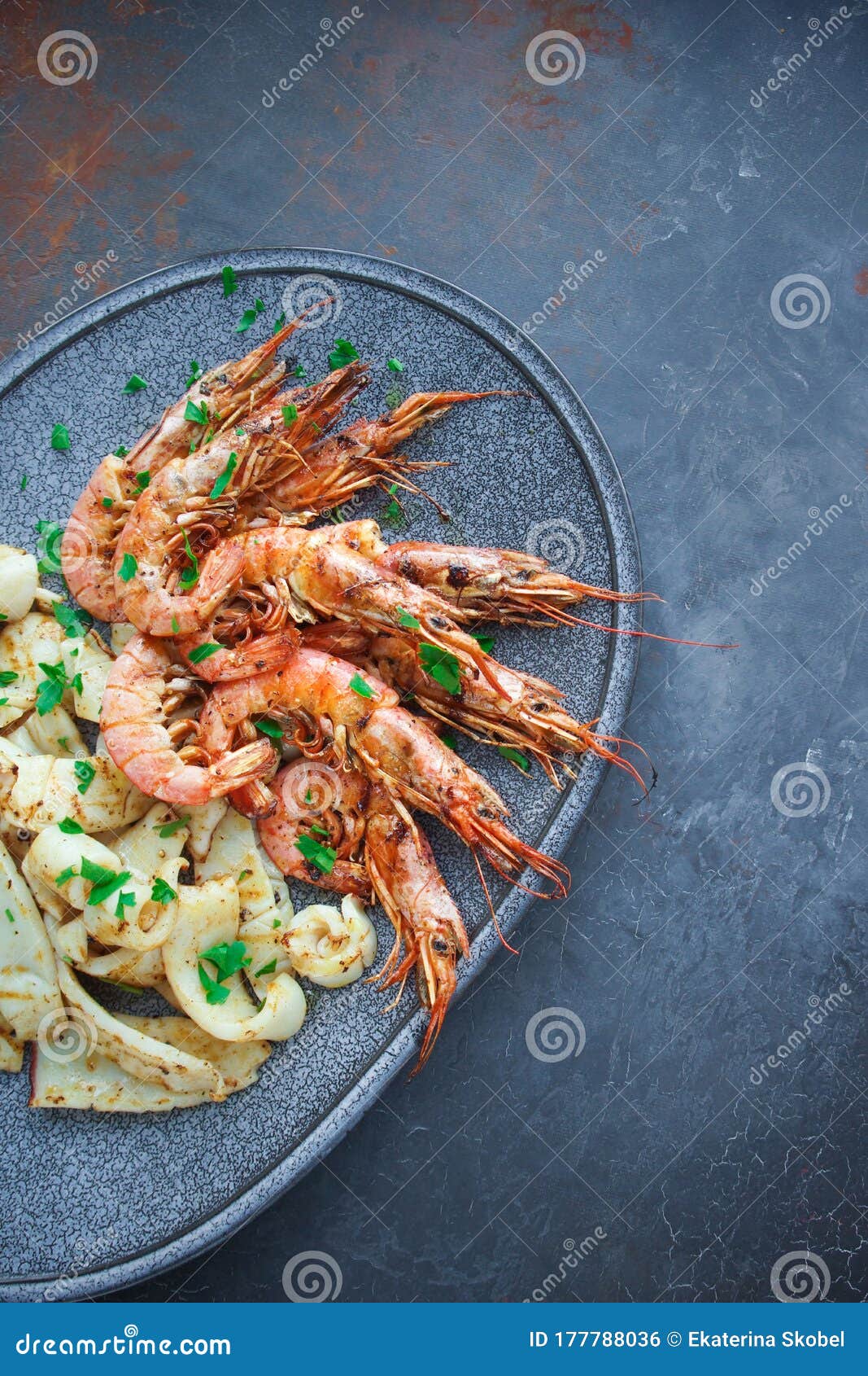 Plate with Seafood, King Prawns and Squid, Fish Menu in the Restaurant ...