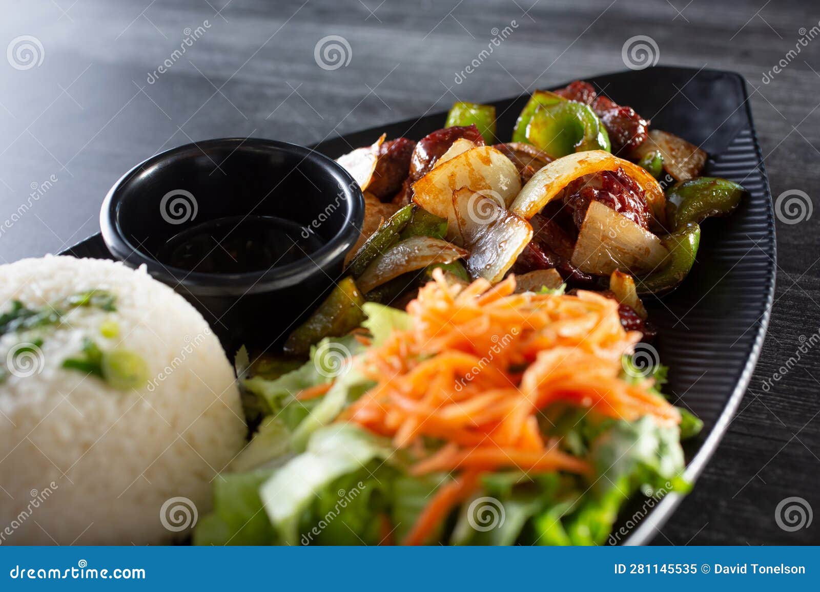 Plate of shaken beef stock image. Image of peppers, onion - 281145535