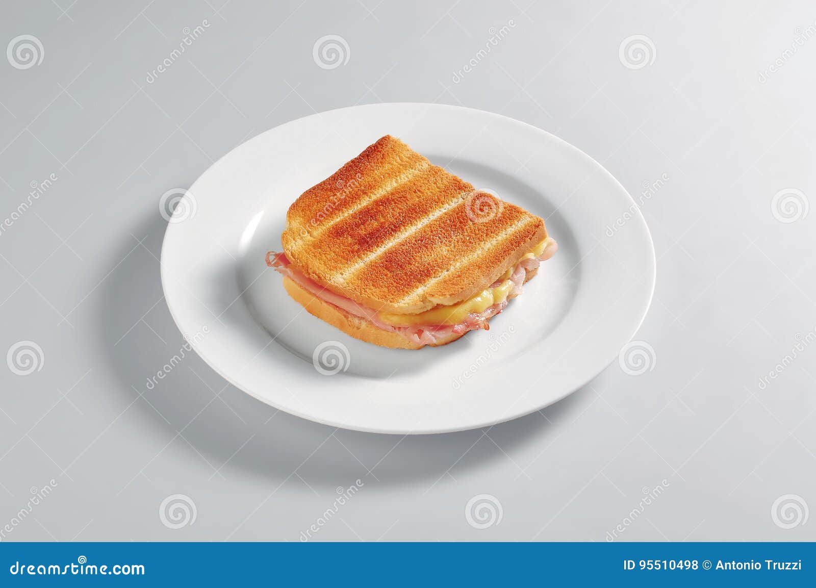 Plate with single toast stock photo. Image of bread, grated - 95510498