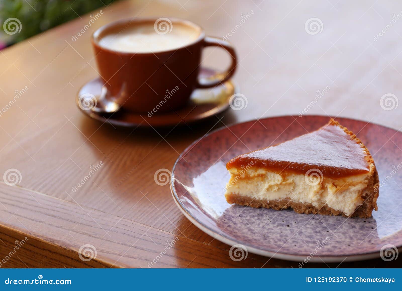 Plate with Slice of Cake on Table Stock Photo - Image of table, caramel ...