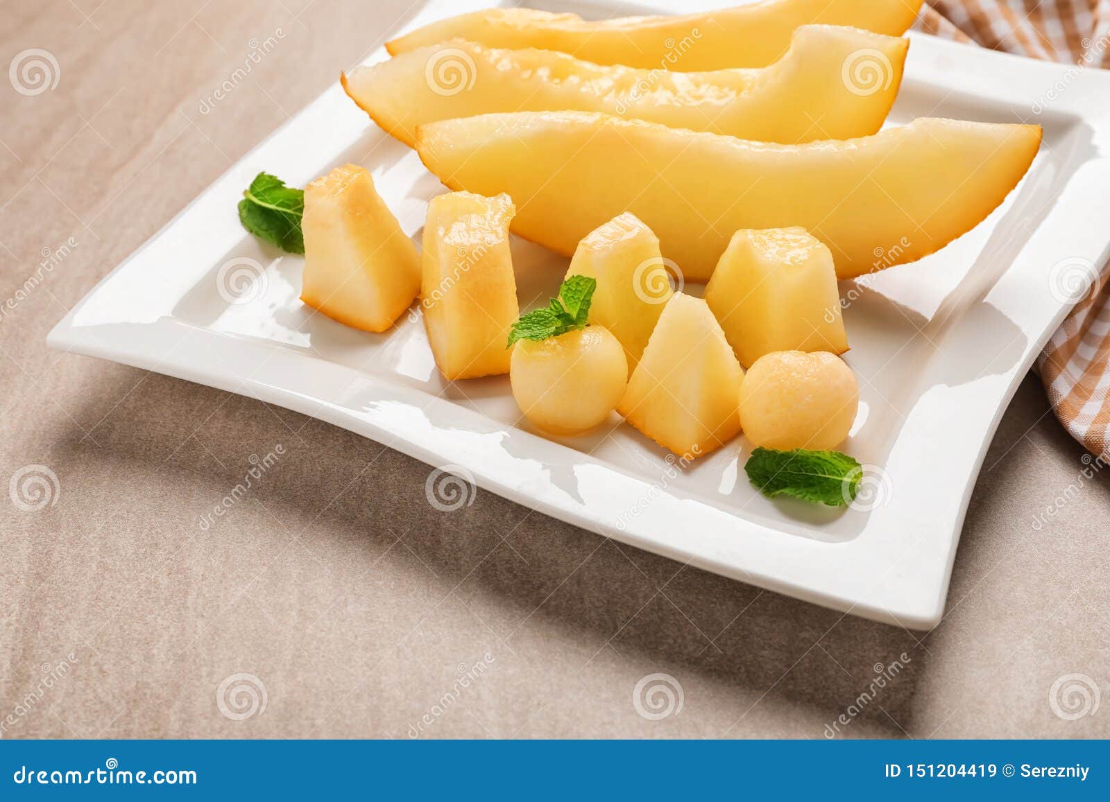 Plate with Sliced Ripe Melon on Table Stock Image - Image of taste ...