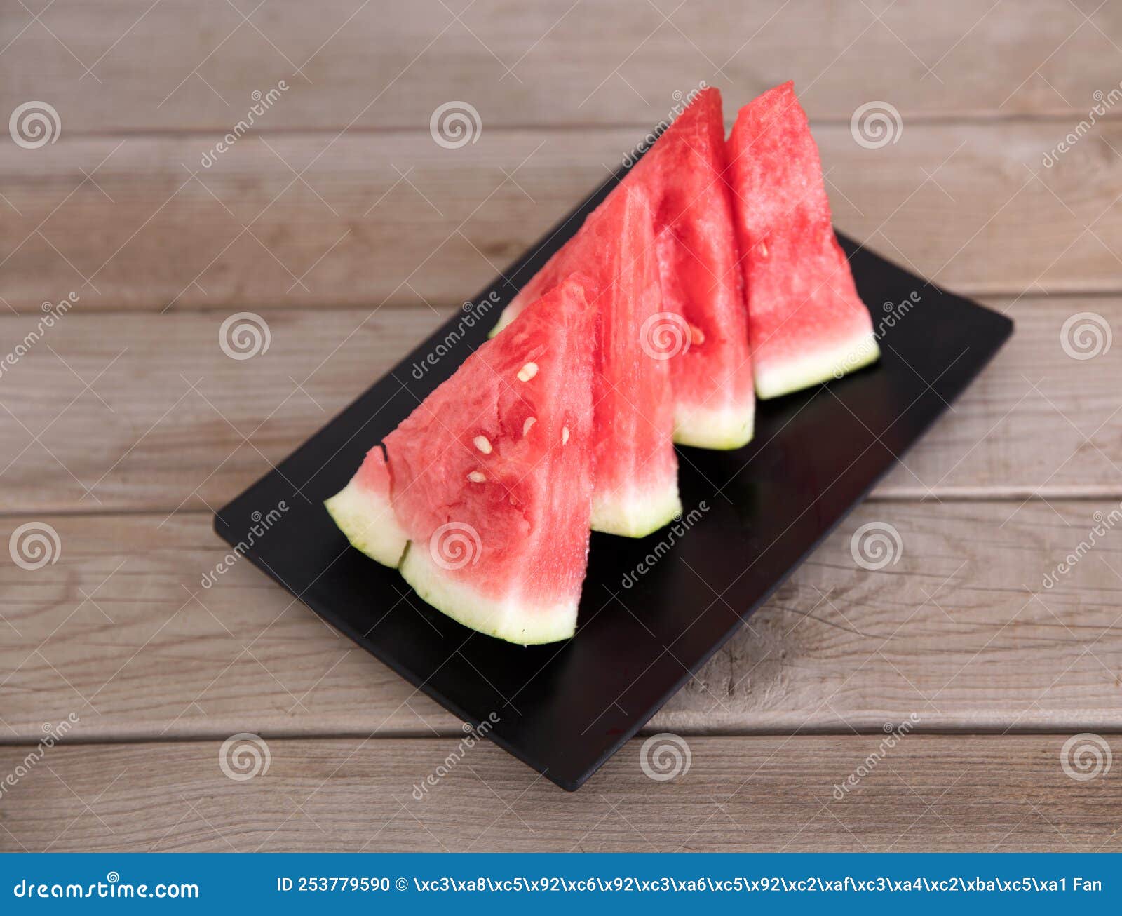 A Plate of Sliced Watermelon Stock Photo - Image of juicy, products ...
