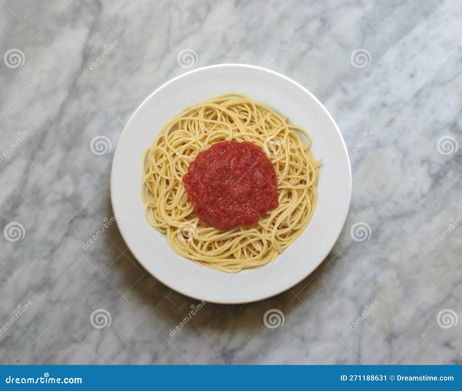 Plate of Spaghetti with Tomato Sauce Viewed from Above on a Marble ...