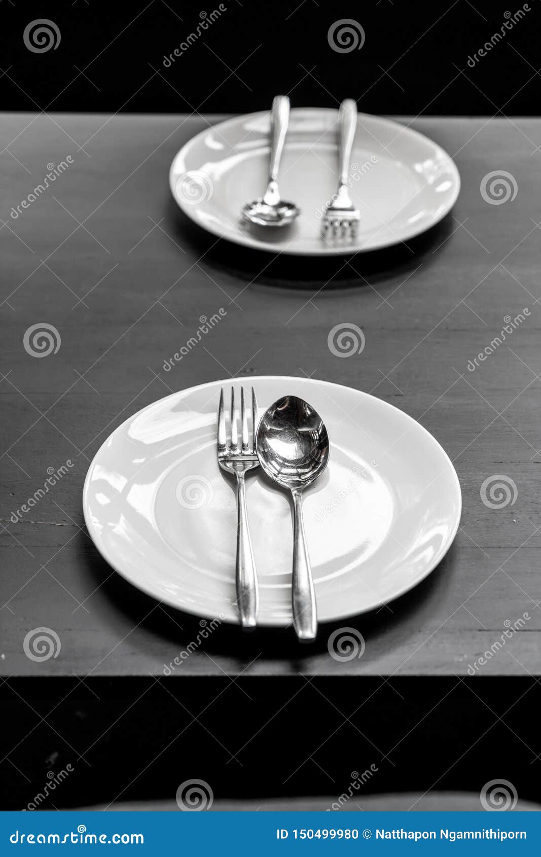 Plate with Spoon and Fork on Dining Table Stock Photo - Image of luxury ...