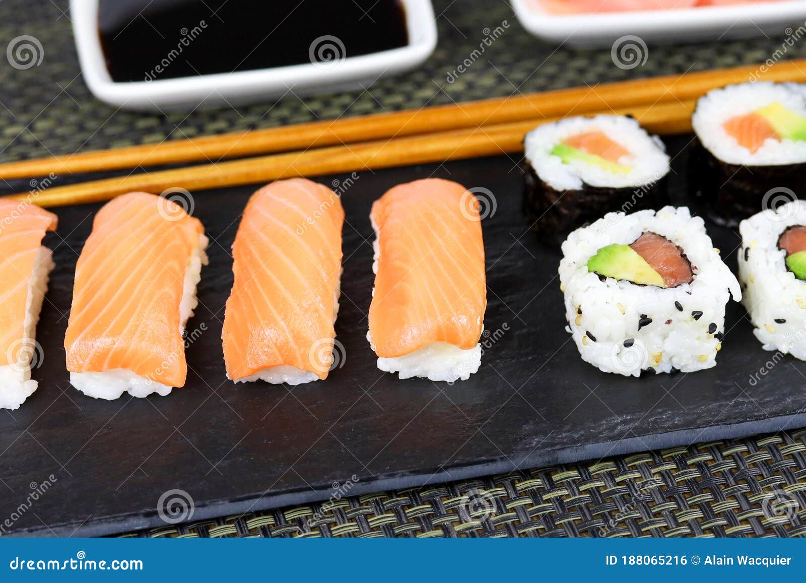 Plate of sushi and maki stock photo. Image of seaweed - 188065216