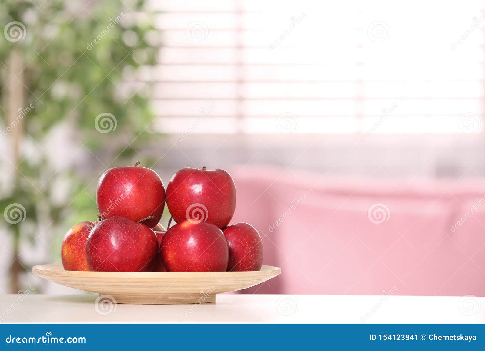 Plate with Sweet Red Apples on Table in Room Stock Image - Image of ...