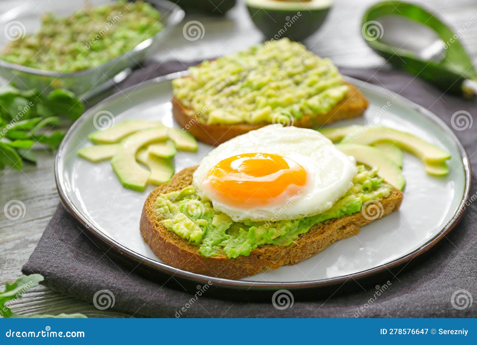 Plate with Tasty Avocado Toasts on Table Stock Image - Image of piece ...