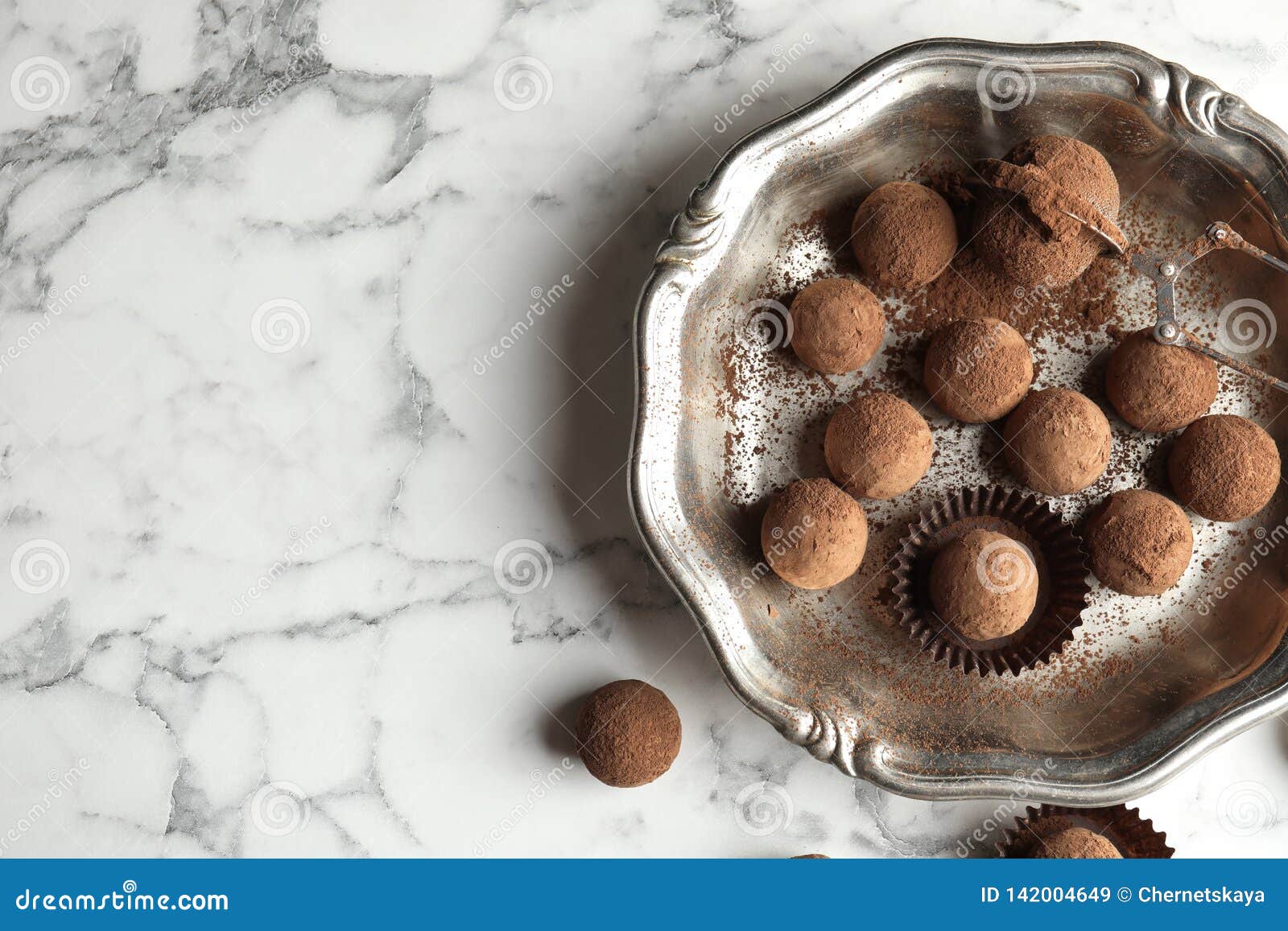 Plate of Tasty Chocolate Truffles on Marble Background, Top View Stock ...