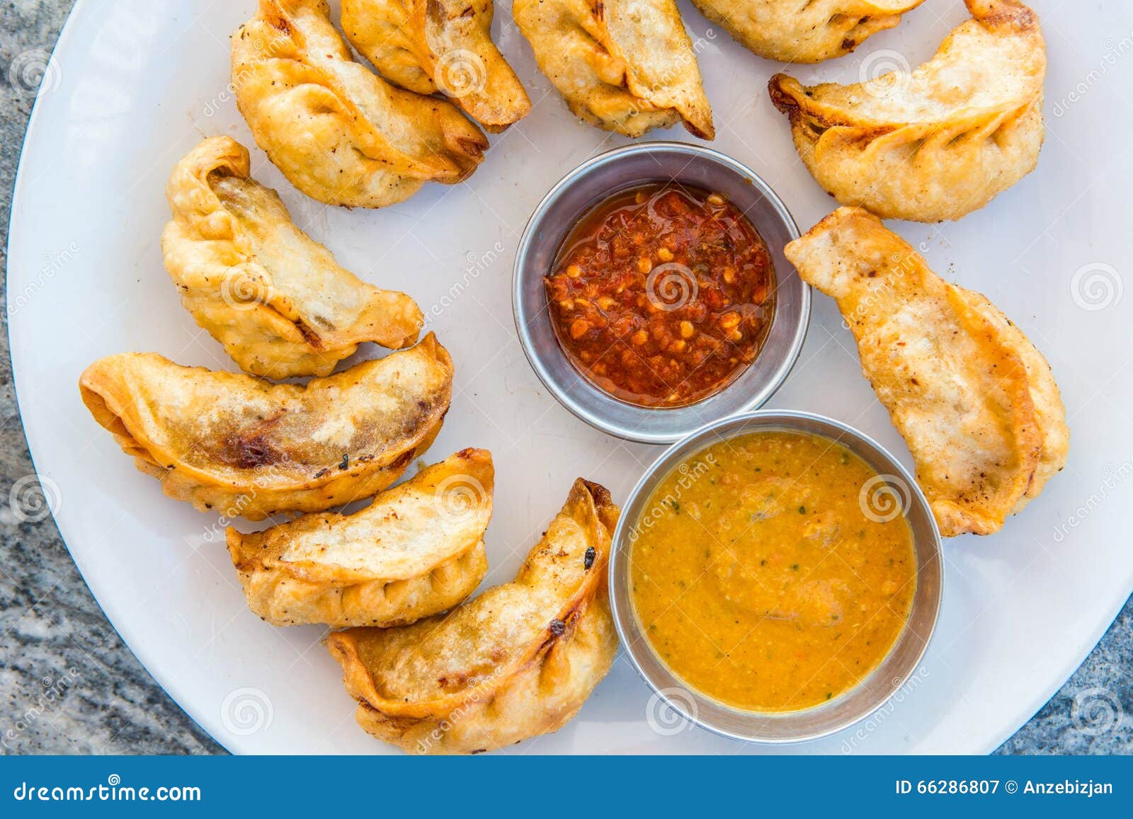 Plate of Traditional Momos. Stock Image - Image of finger, spicy: 66286807