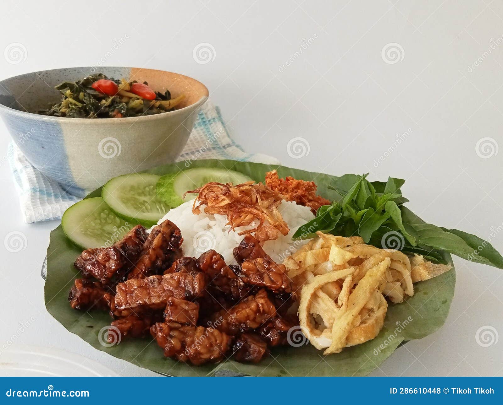 A Plate of Typical Jakarta Uduk Rice Complete with Side Dishes Stock ...