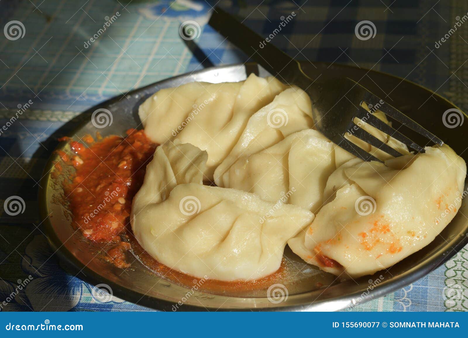A Plate of Veg Steamed Momo with Sauce Chutney in Black Background with ...