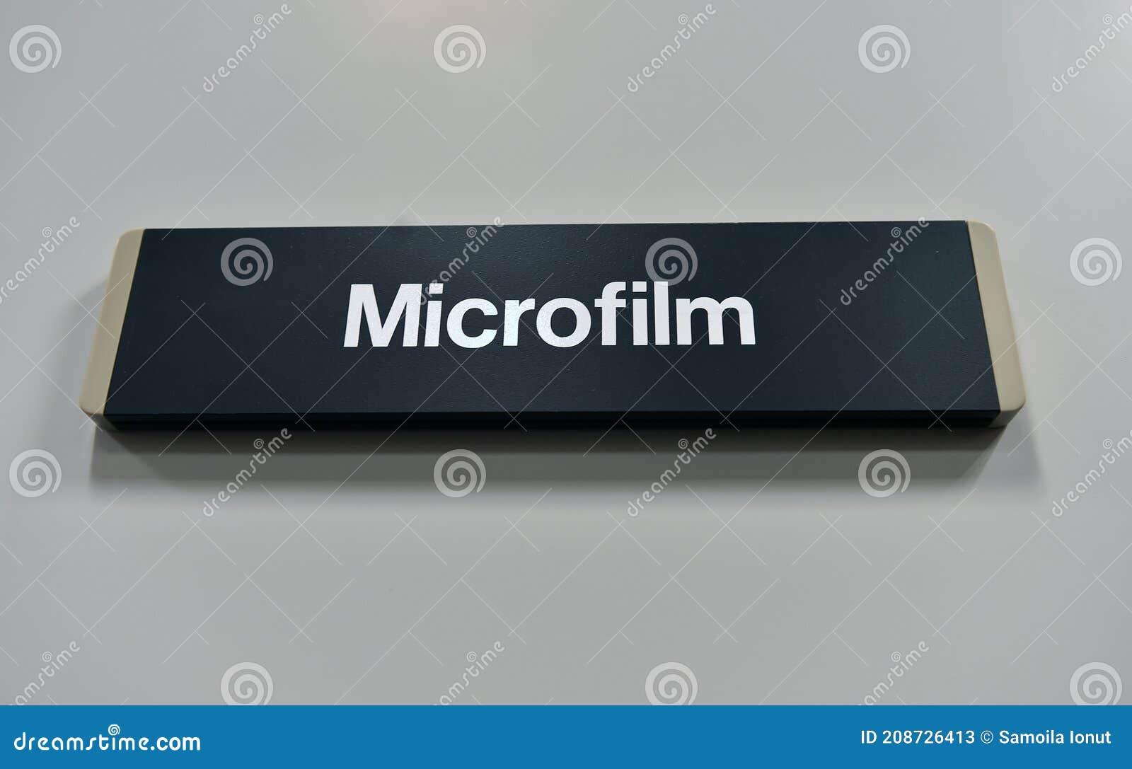 The Plate on Which he Writes Microfilm on a Gray Background. Stock ...