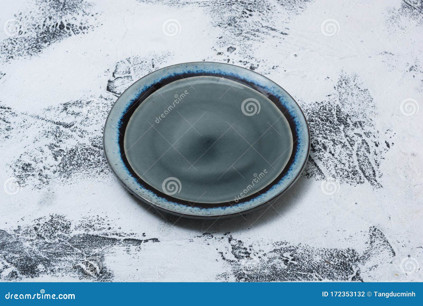 Plate on White Scraped Wooden Background Side View Stock Photo - Image ...