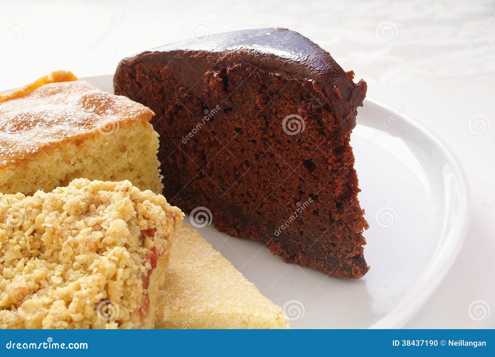 Plated cake selection stock photo. Image of treat, flapjack - 38437190